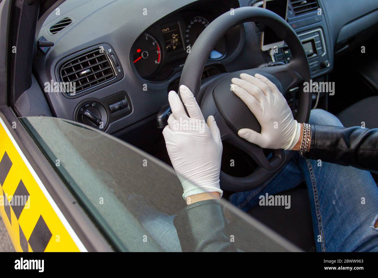Taxi driver in gloves hi-res stock photography and images - Alamy