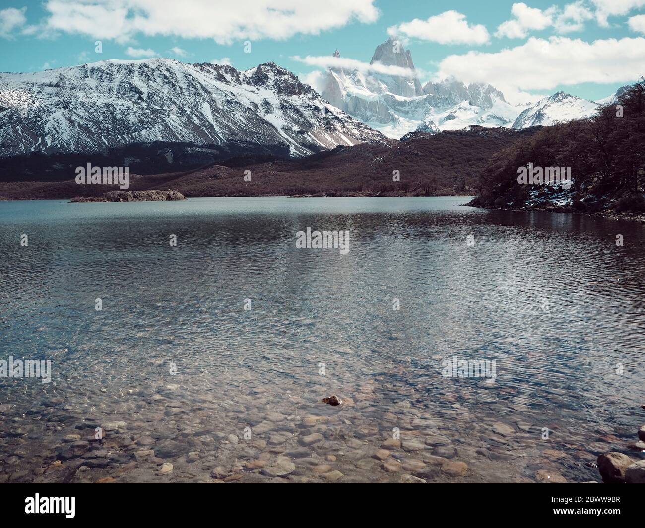 Idyllic shot of Laguna Torre with snowcapped Andes range in background ...