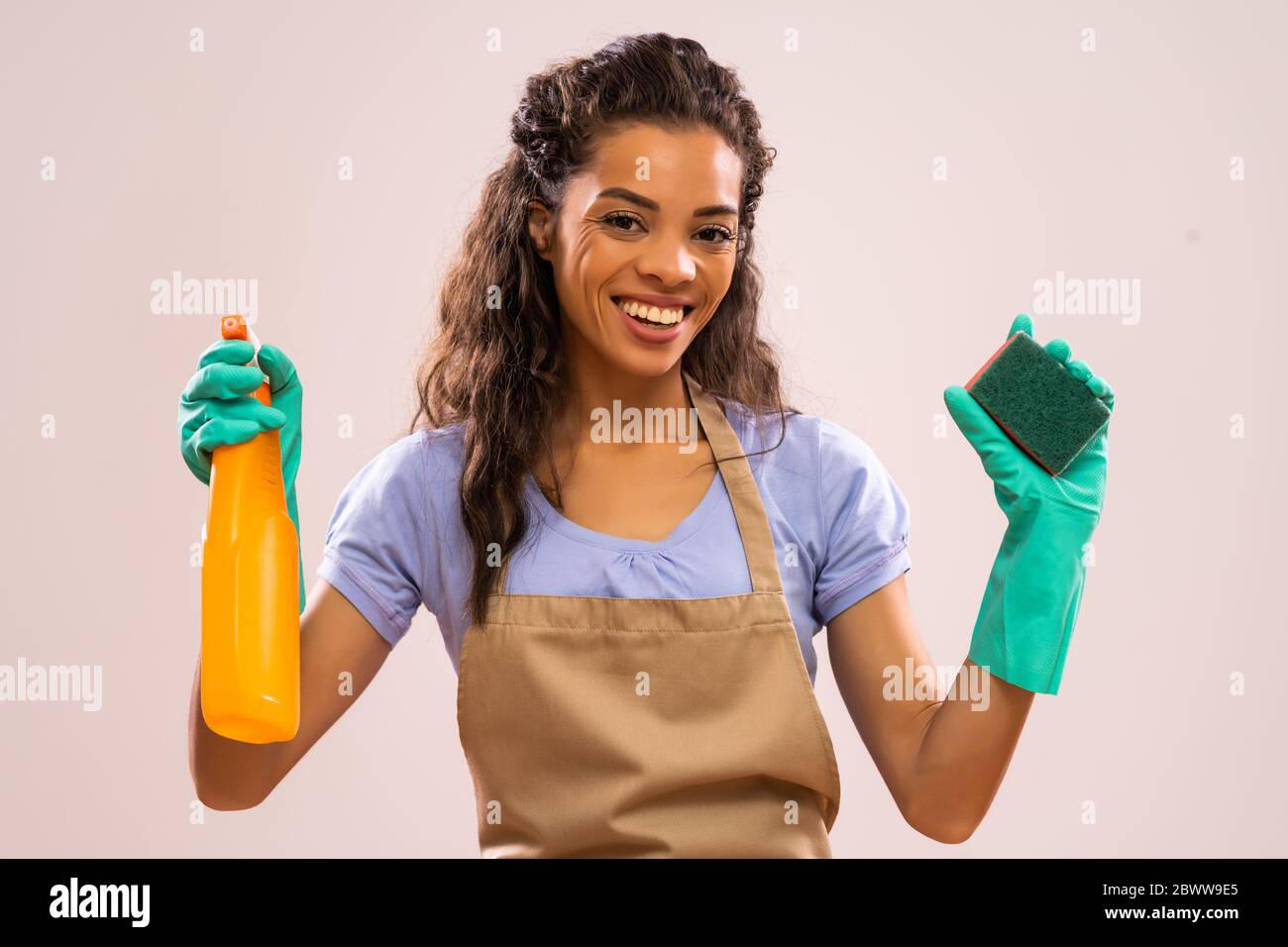 Portrait of happy and successful african-american housewife who is ...