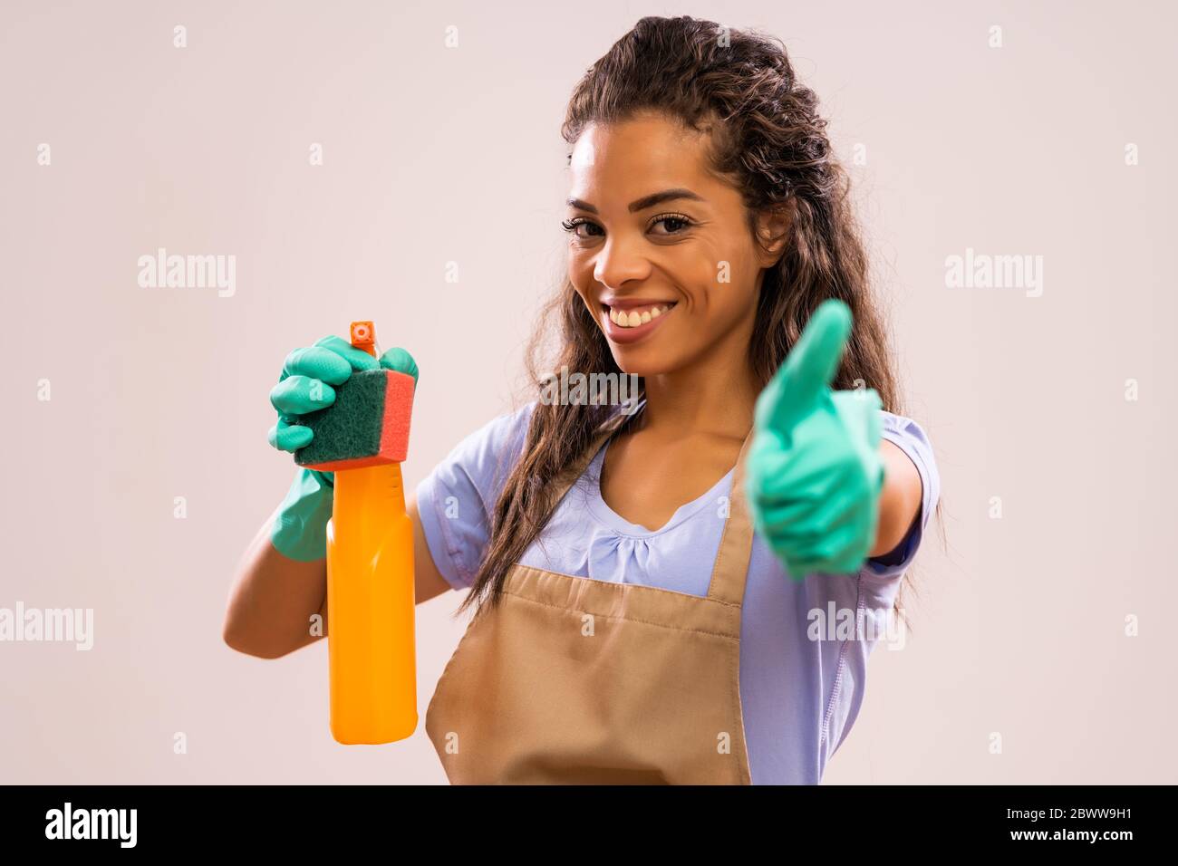 Portrait of happy and successful african-american housewife who is ...