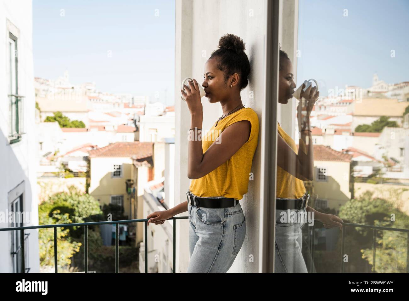 Drinking coffee on the balcony hi-res stock photography and images - Alamy