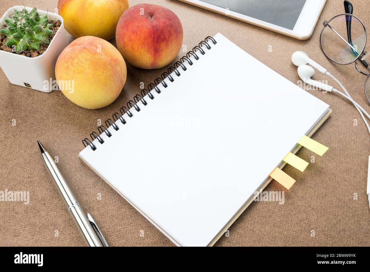 Student desk with notebook and pen Stock Photo - Alamy