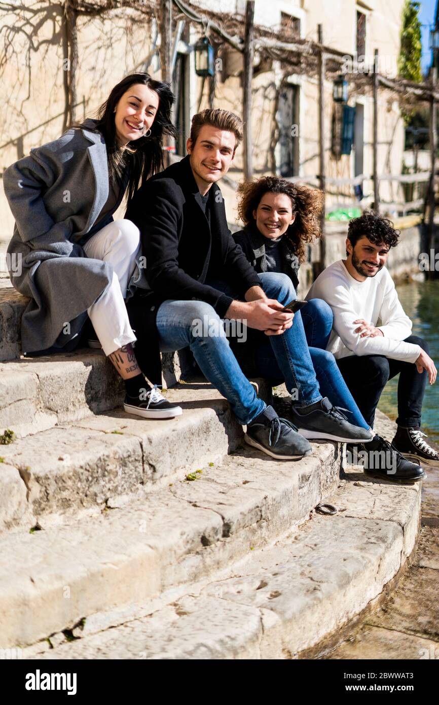 Group Of People Sitting Down