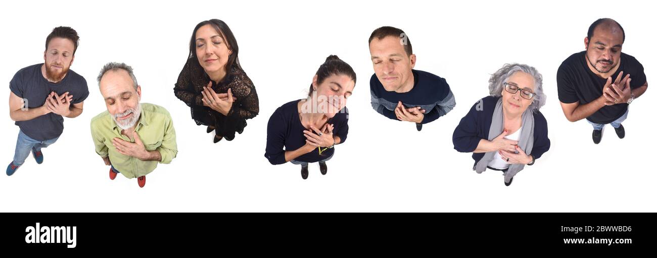 Woman hands on chest eyes closed Cut Out Stock Images & Pictures - Alamy