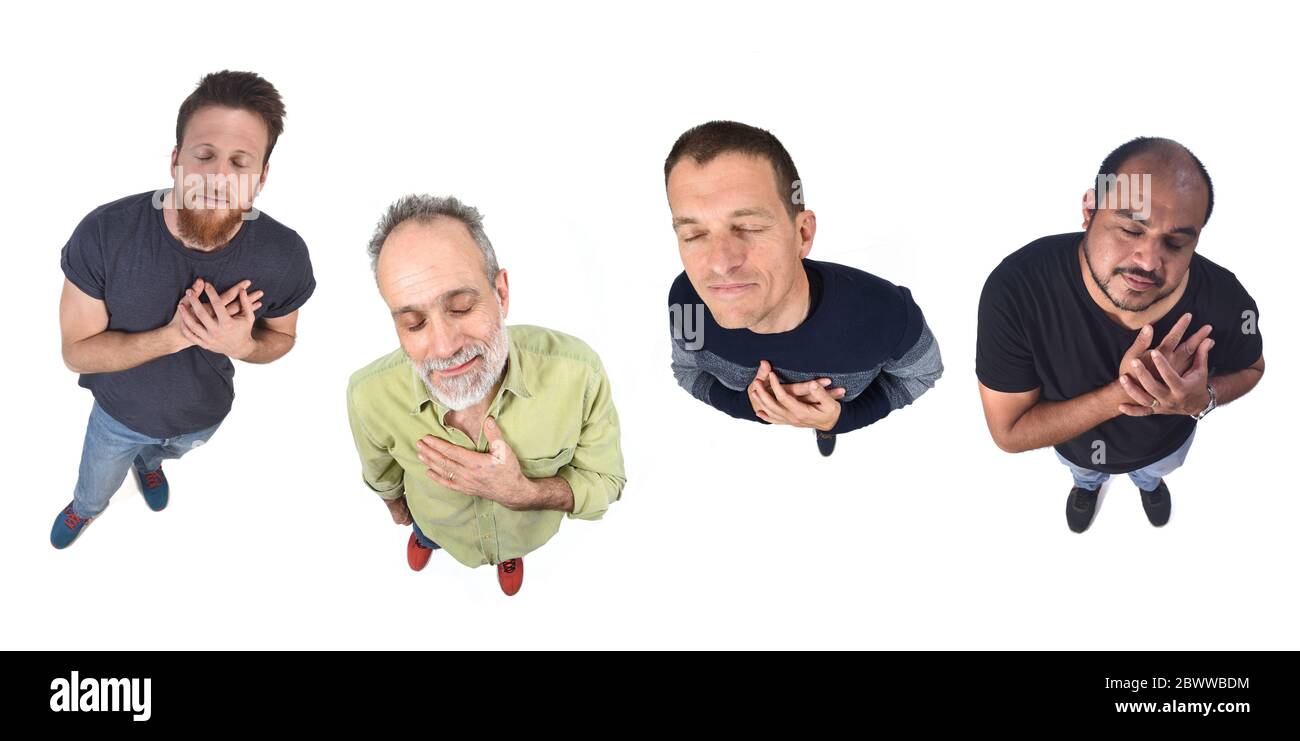 men with hand on heart on white background Stock Photo - Alamy
