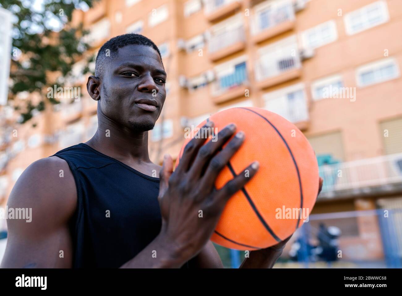 Portrait young man basketball hi-res stock photography and images - Alamy