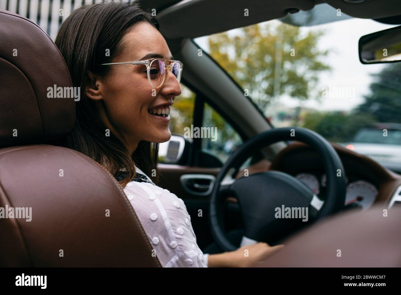 Woman driving convertible car hi-res stock photography and images - Alamy