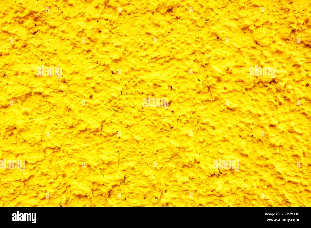 Yellow Stucco Texture Background Stock Photo - Alamy