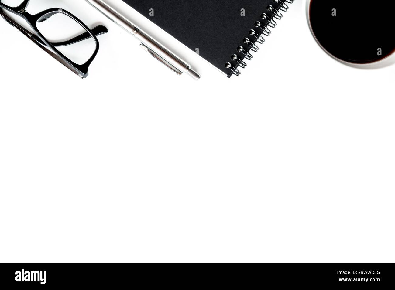 White clean office desk table with supplies. Top view with copy space ...