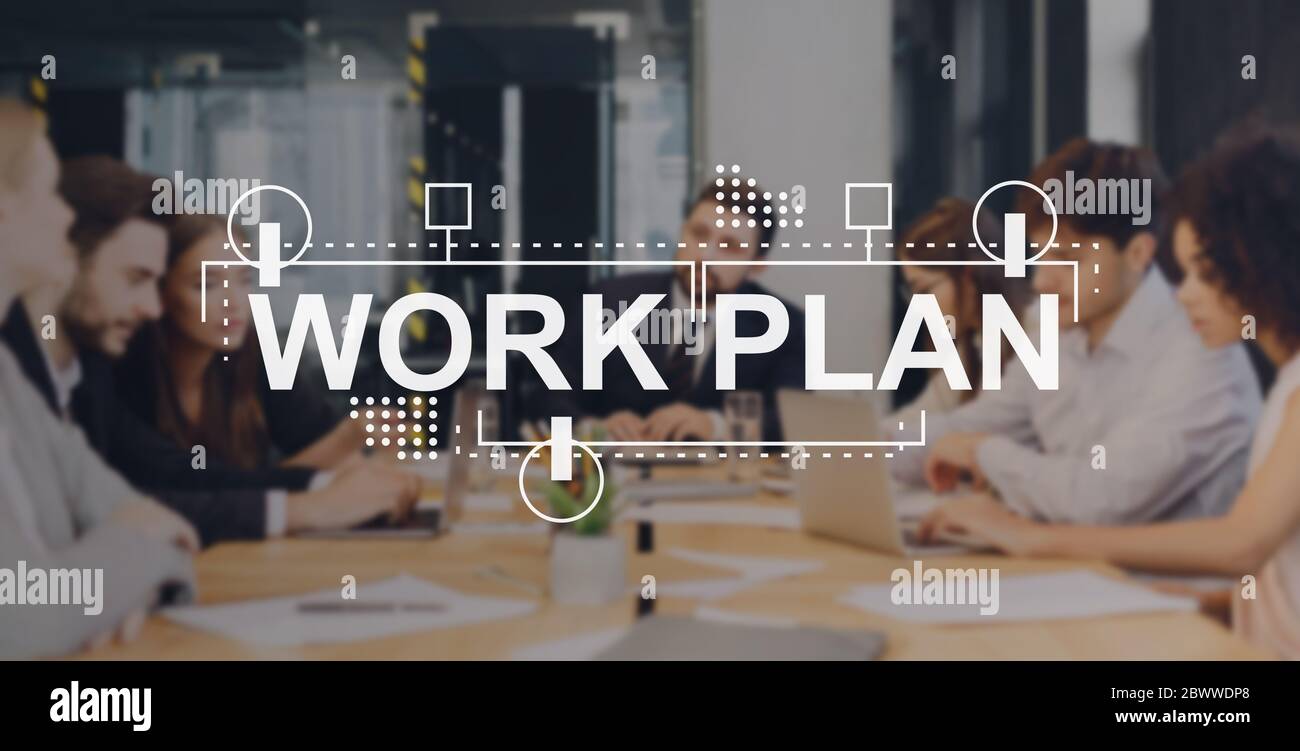 Work plan written on group of people discussing work Stock Photo - Alamy