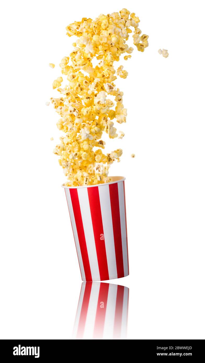 Flying popcorn from paper striped bucket isolated on white background ...