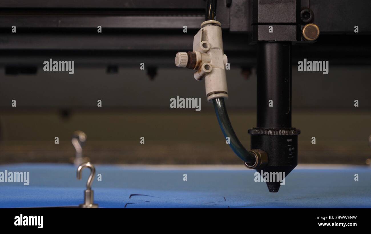 Industrial garment factory, an automatic sewing machine sews various ...