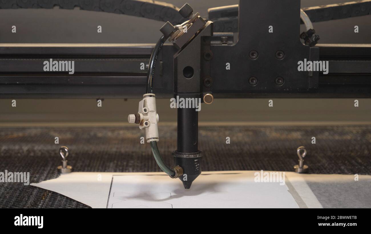 Industrial garment factory, an automatic sewing machine sews various ...