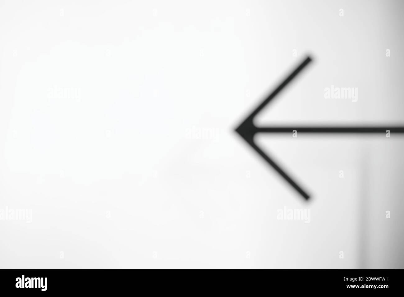 Blurred Arrow Sign Background Stock Photo - Alamy
