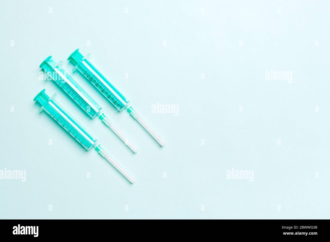 Top view of medical syringes on colorful background with copy space ...