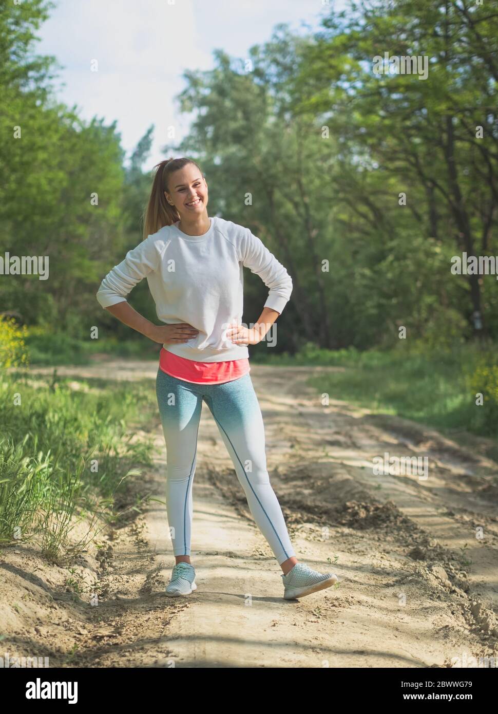 Young Blonde Caucasian Female Forest Runner Posing Stock Photo - Alamy
