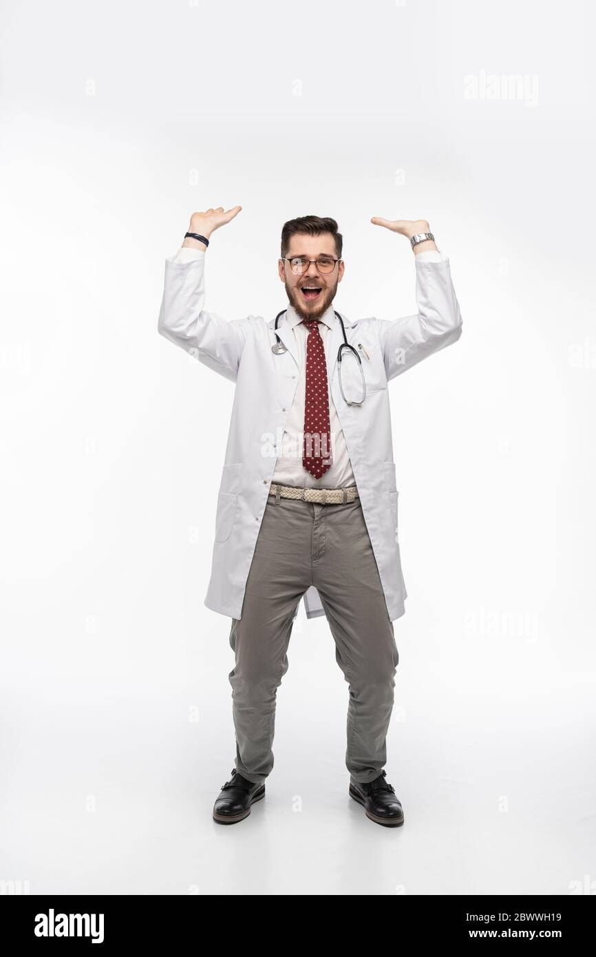 A portrait of a medical doctor posing against white background Stock ...