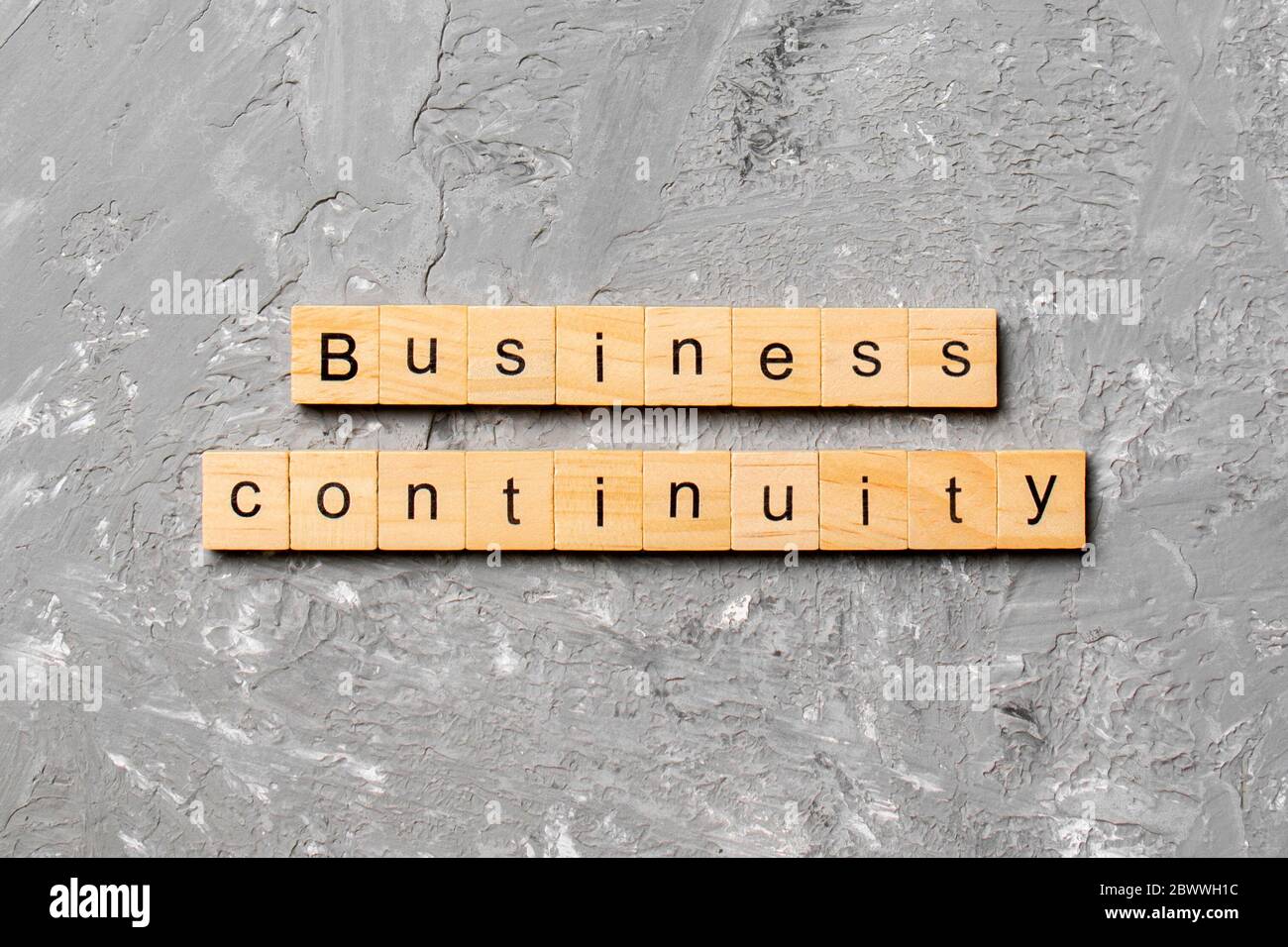 Business Continuity word written on wood block. Business Continuity ...