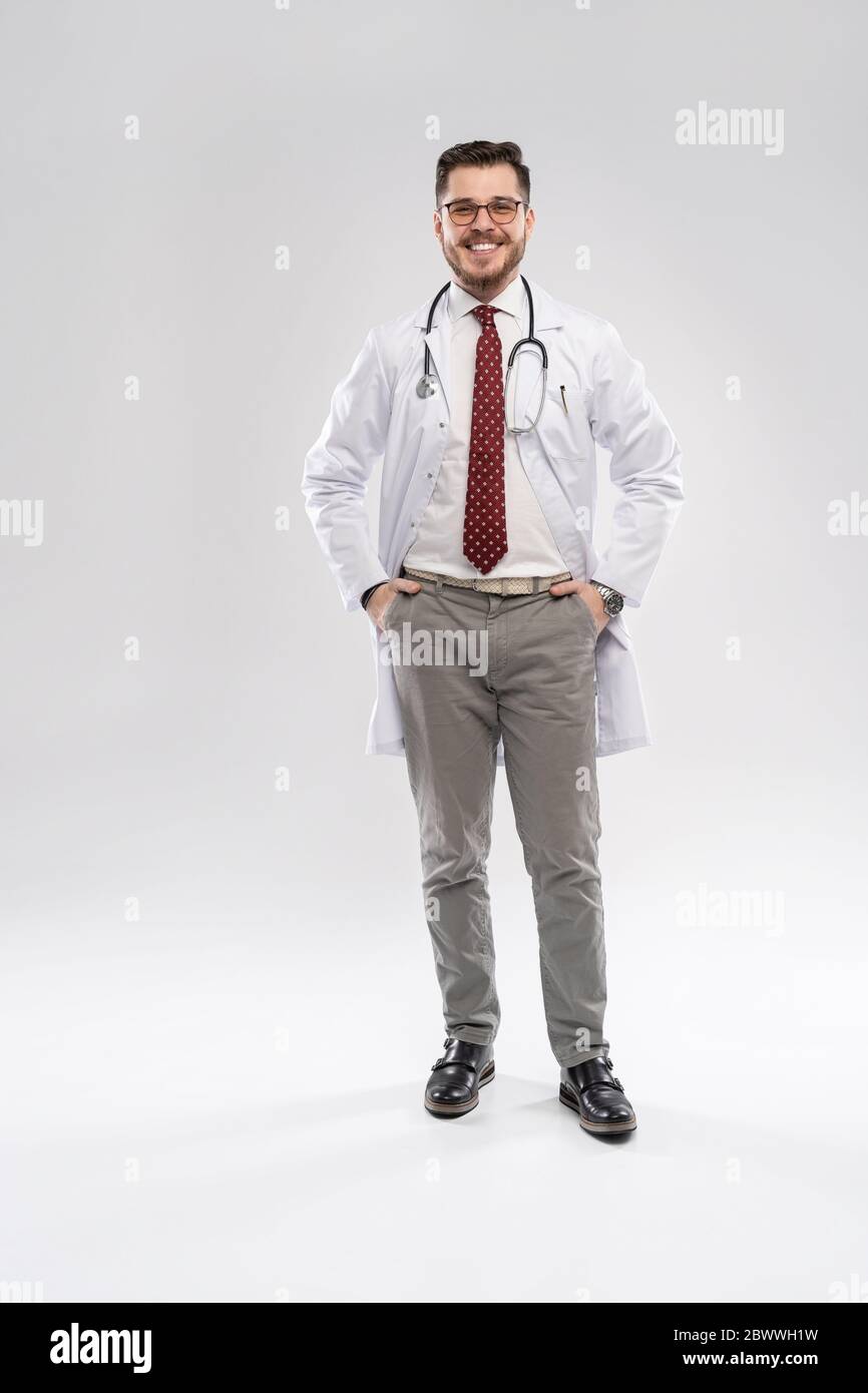 A portrait of a medical doctor posing against white background Stock ...
