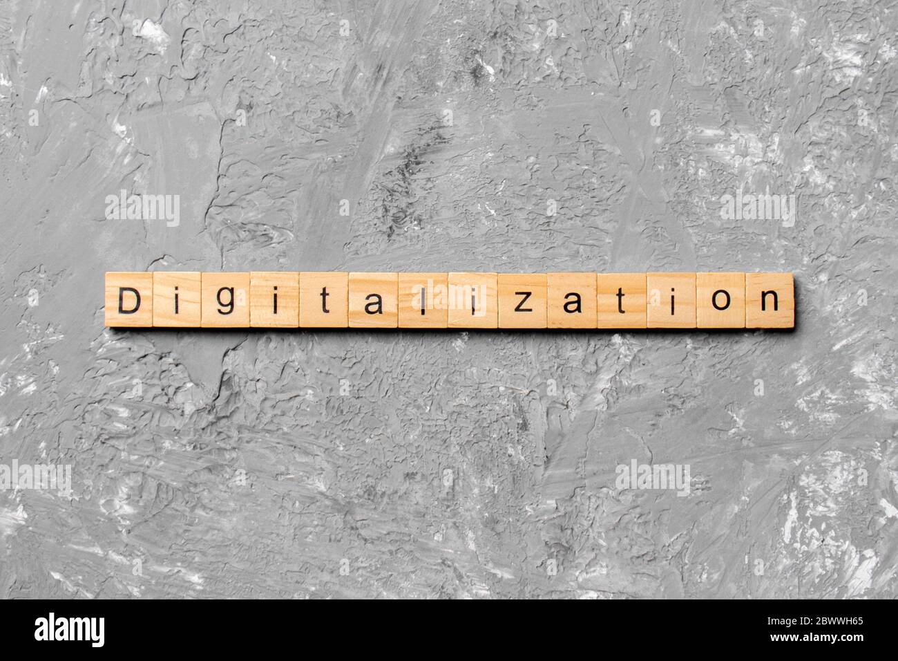 digitalization word written on wood block. digitalization text on ...