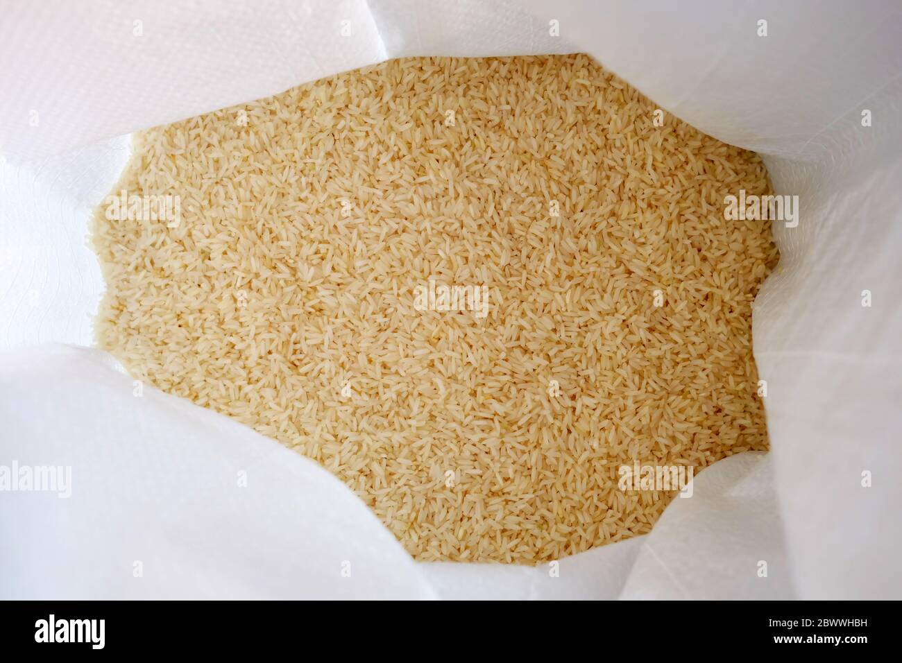 Top View of Rice in White Nylon Sack Stock Photo - Alamy