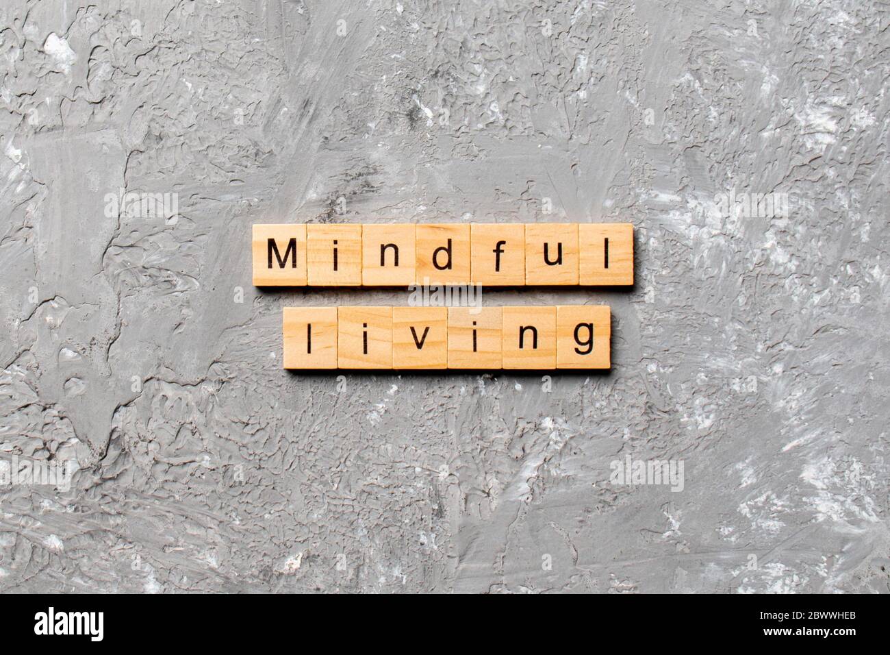 mindful living word written on wood block. mindful living text on table ...
