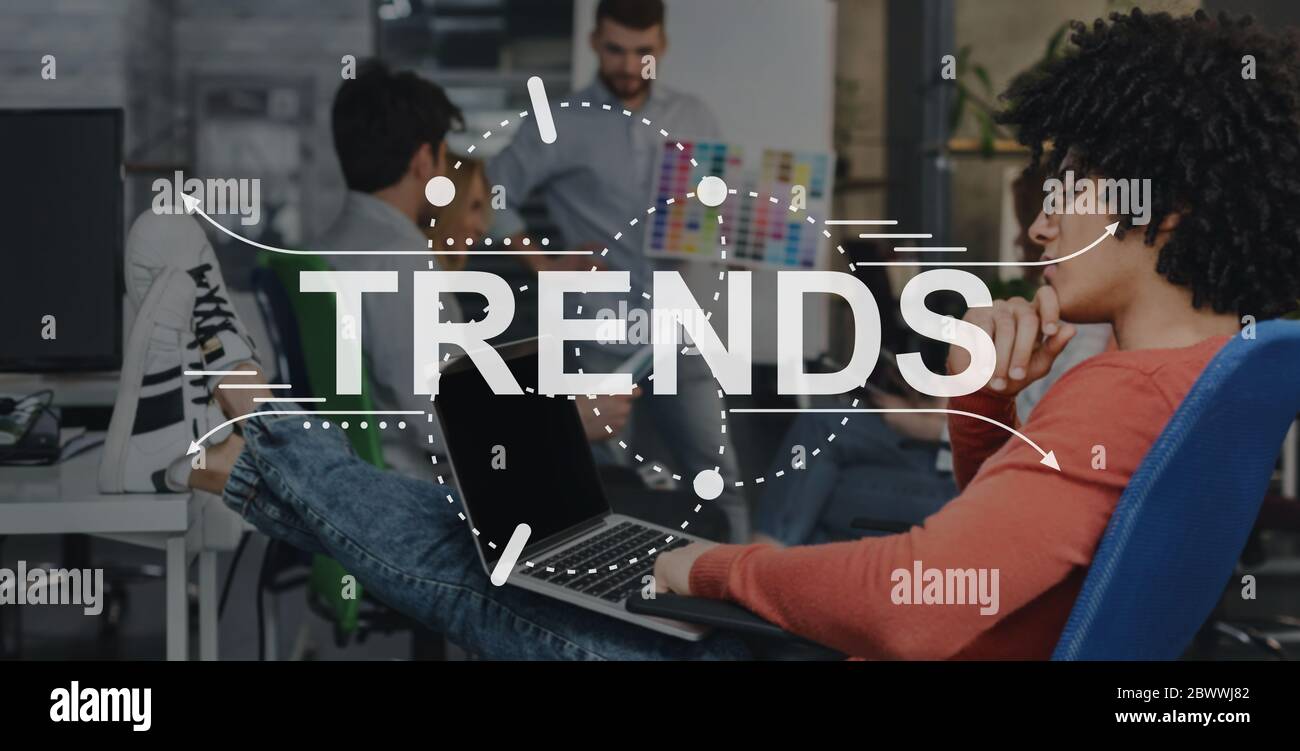 The word Trends written on blurred office background Stock Photo - Alamy