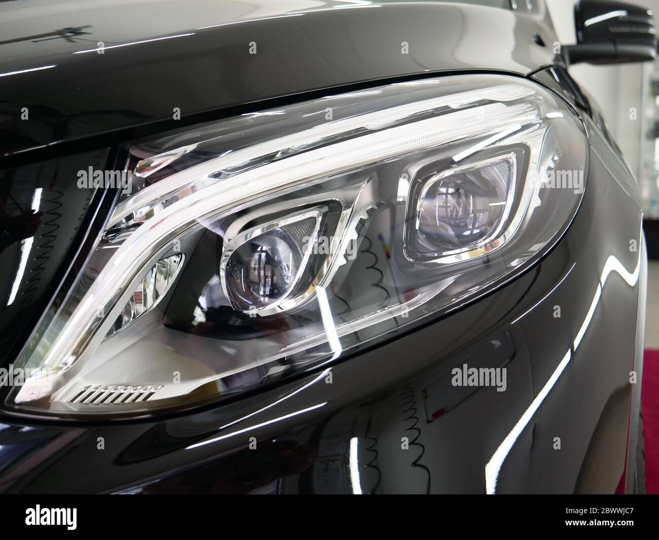 Infrared drying of car body parts after applying putty and paint on a ...