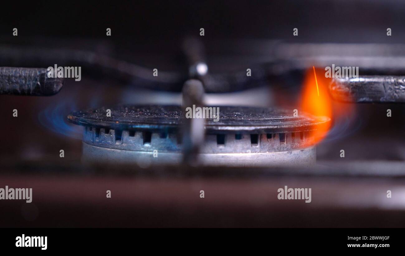 Very closely displayed as the gas stove is lit, checking on and off ...