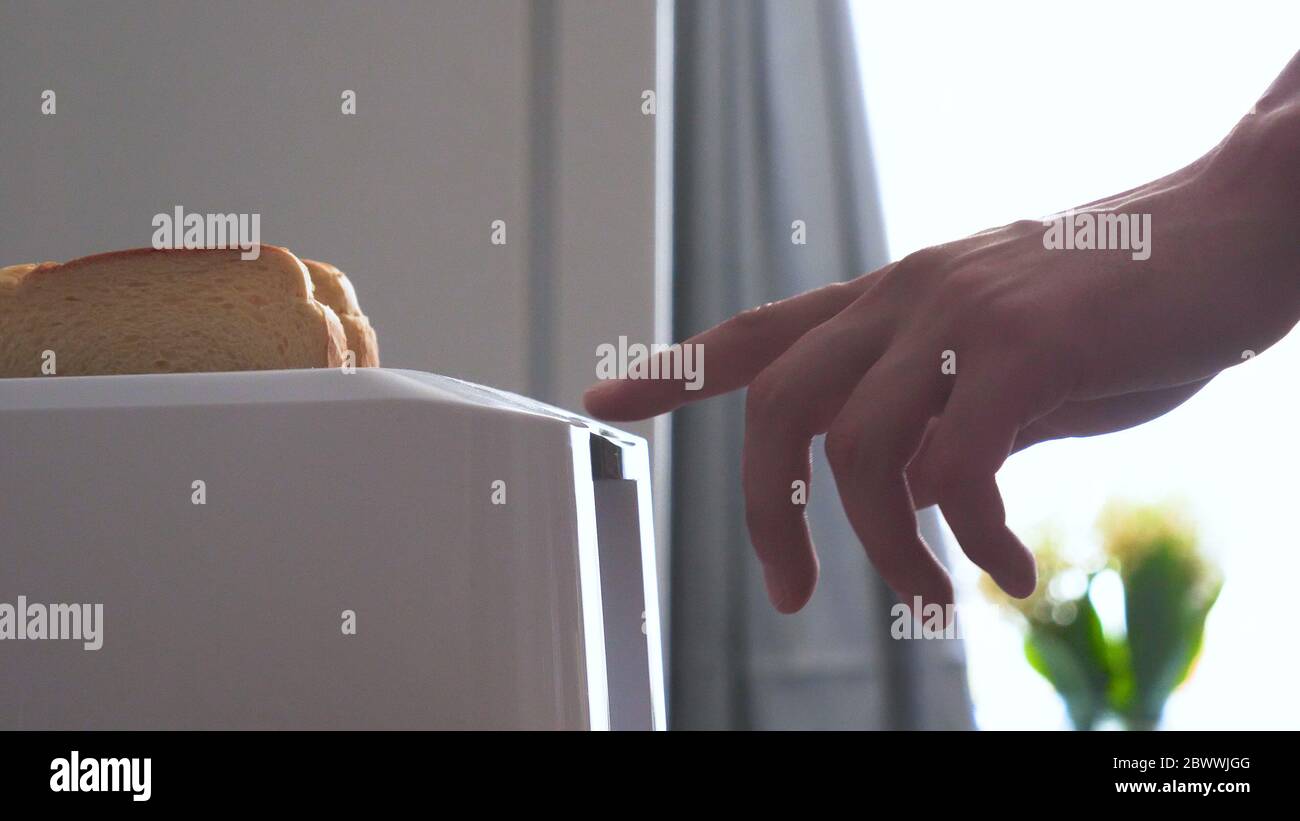 In the kitchen, a guy (girl) pulls out food from the refrigerator and ...