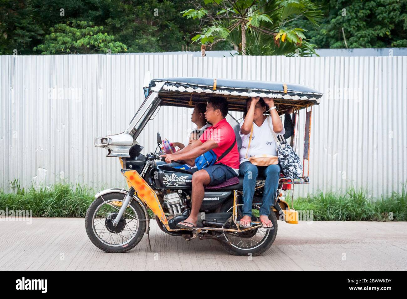 The famous filipino tricycle or tuk tuk (sometimes called rickshaw ...