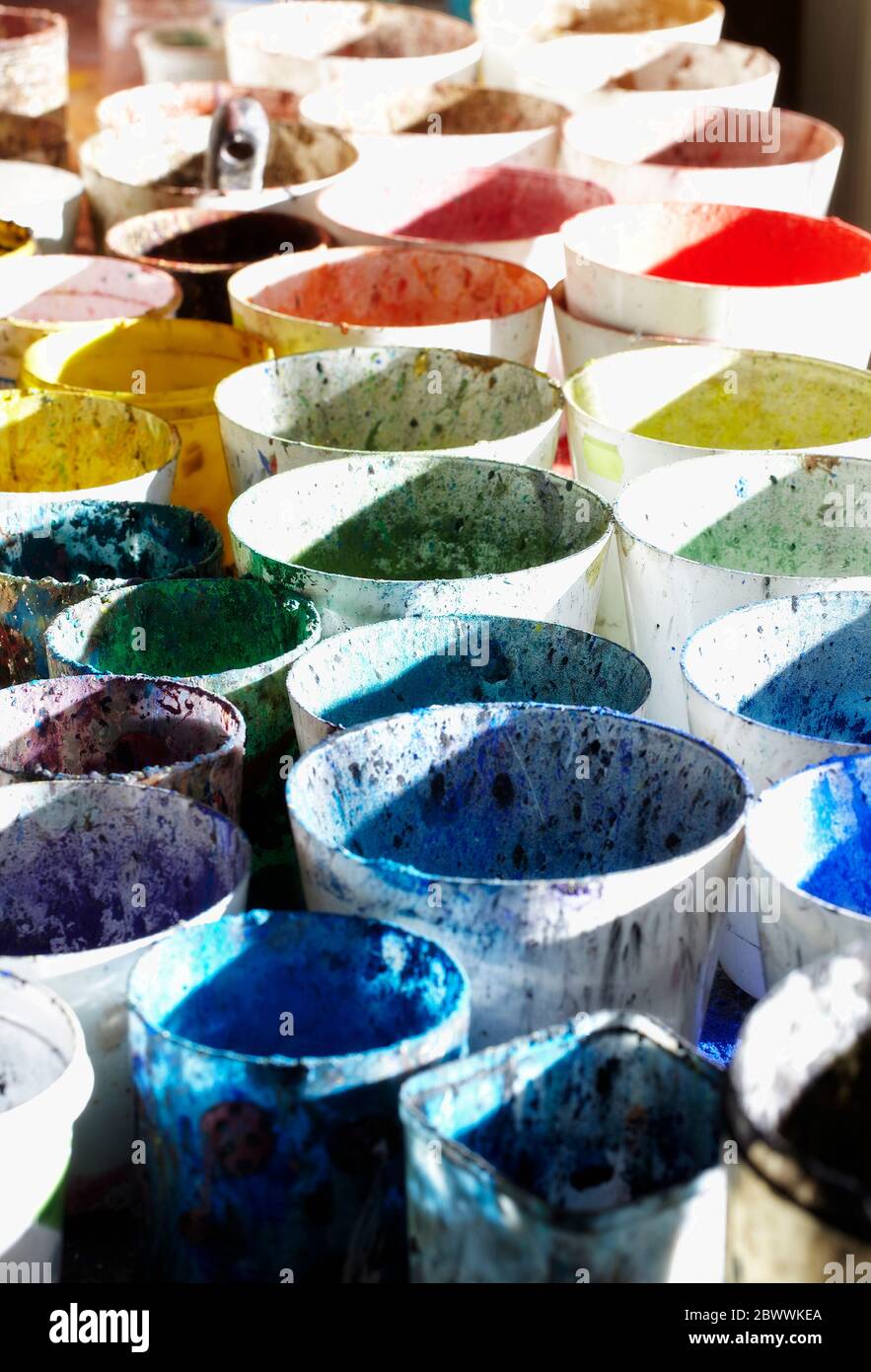 Series of color buckets for painting Stock Photo - Alamy