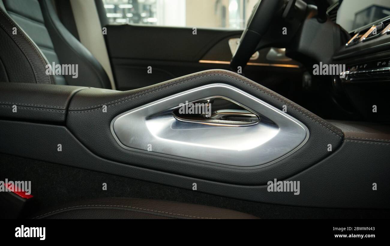 Paint protection film installation on side panel surface of luxury ...