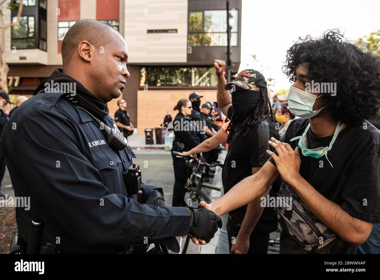 Oakland, Ca. 2nd June, 2020. An Oakland Police Officer and a protestor ...