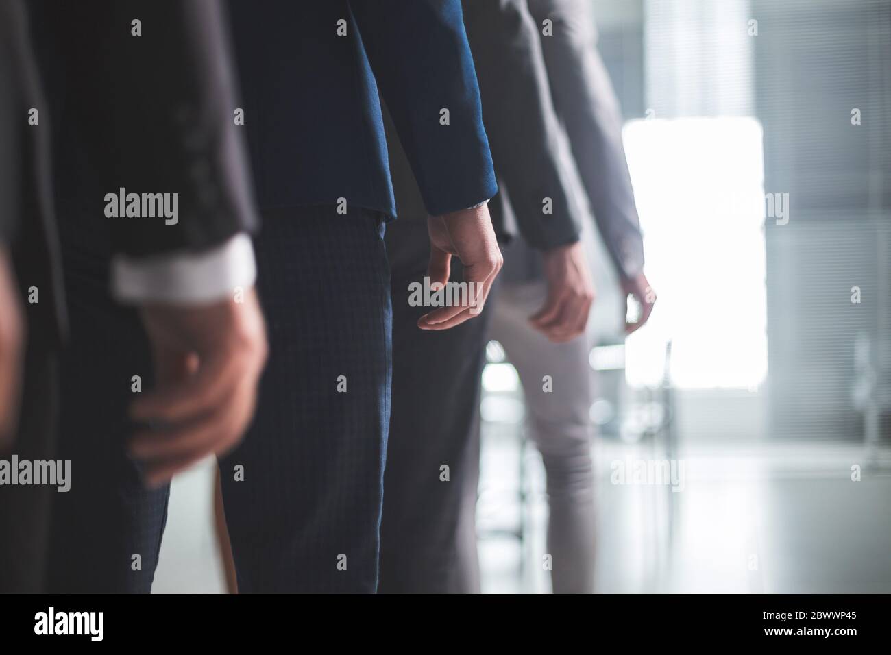 close up. group of employees leaving the office Stock Photo - Alamy