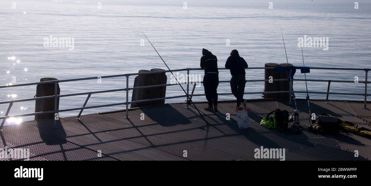 Railing fishing pier hi-res stock photography and images - Alamy