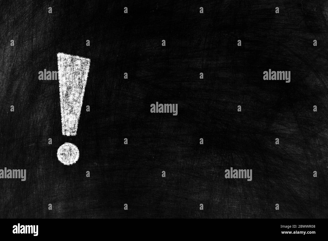 Exclamation Mark on Black Chalkboard Background with Space for Text or ...
