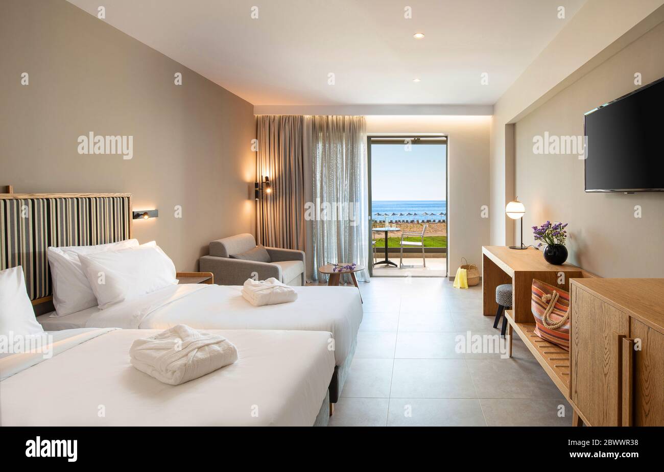 Beige striped and light wood interior of modern minimalistic style ...