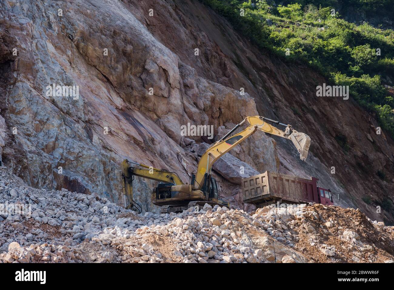 construction equipment working in a construction site Stock Photo - Alamy