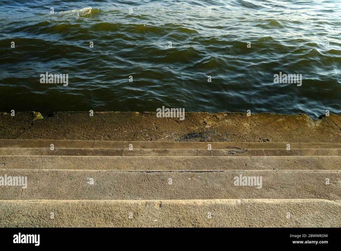 Concrete Pier Stair with Surface of the River Stock Photo - Alamy
