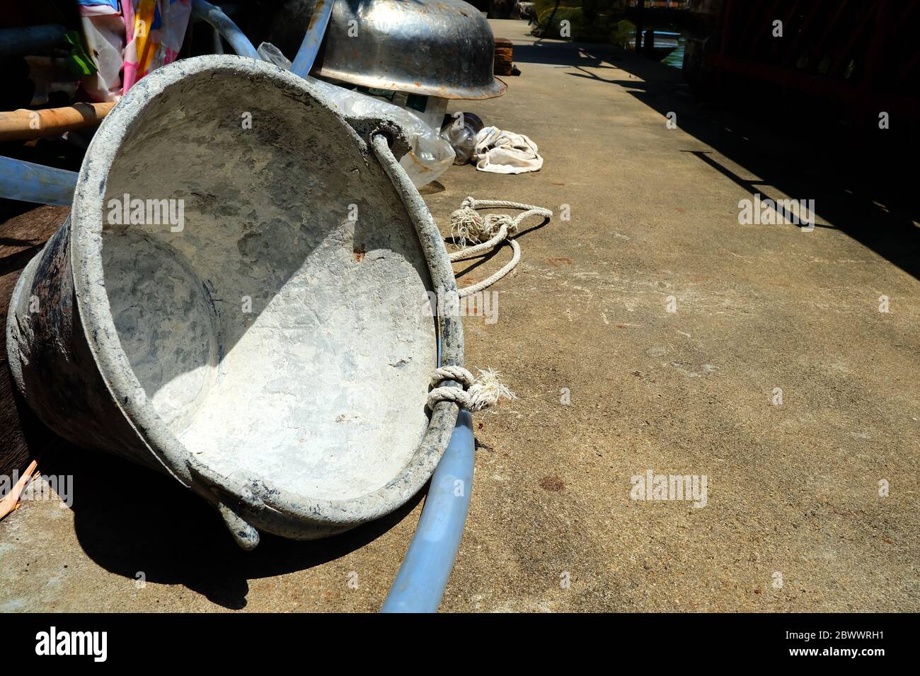 Old White Grunge Bucket for Concrete Mixing Stock Photo - Alamy