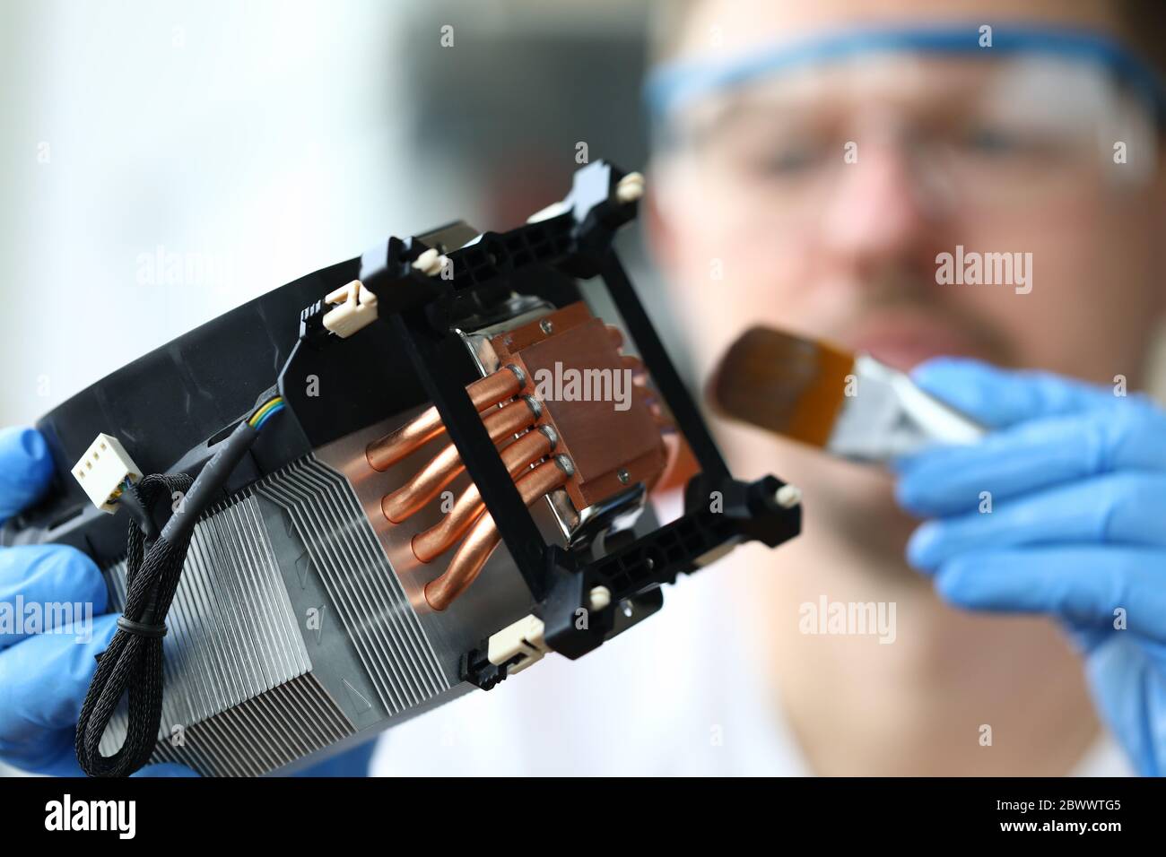 Repair, dust removal brush with electronic device Stock Photo - Alamy