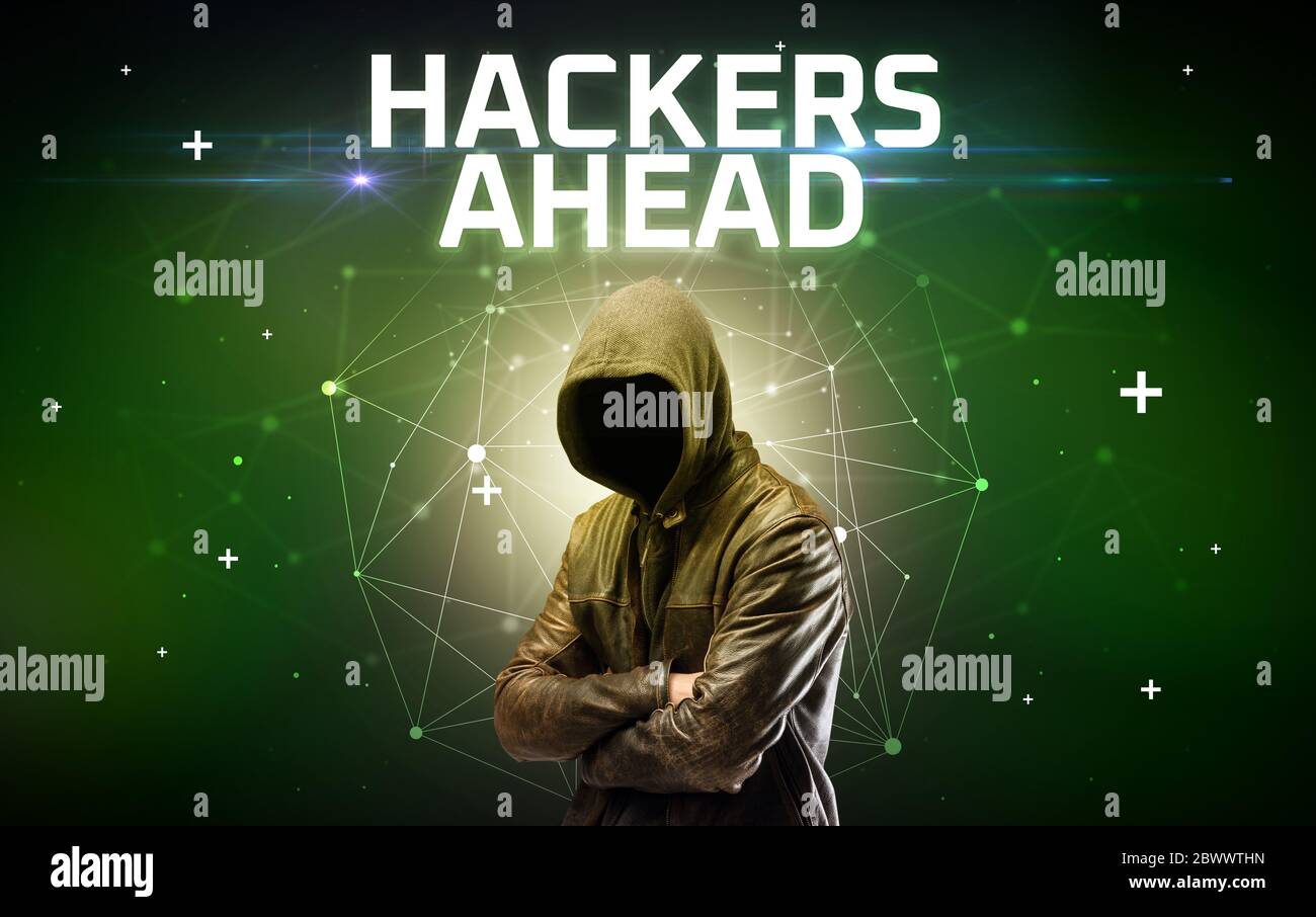 Mysterious hacker with HACKERS AHEAD inscription, online attack concept ...