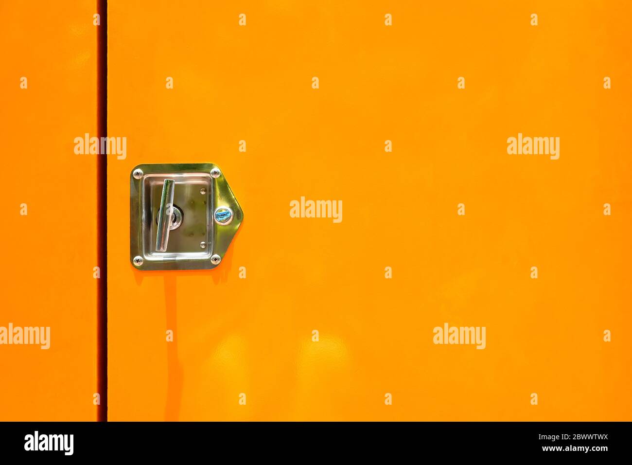 Aluminium Cabin Lock with Yellow Background Stock Photo - Alamy
