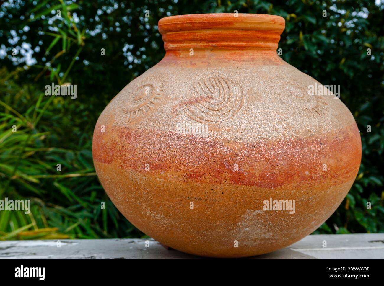 A close up shot of an earthen pot or a clay pot Stock Photo - Alamy