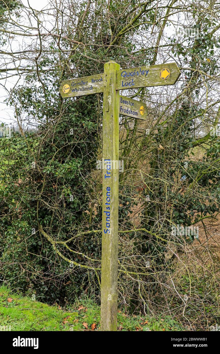 A wooden footpath sign post on the Sandstone Trail, Cheshire, England ...