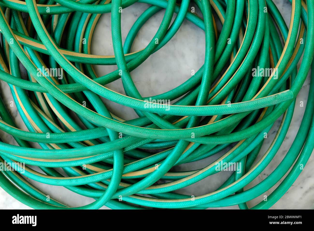 Hose on the ground hi-res stock photography and images - Alamy