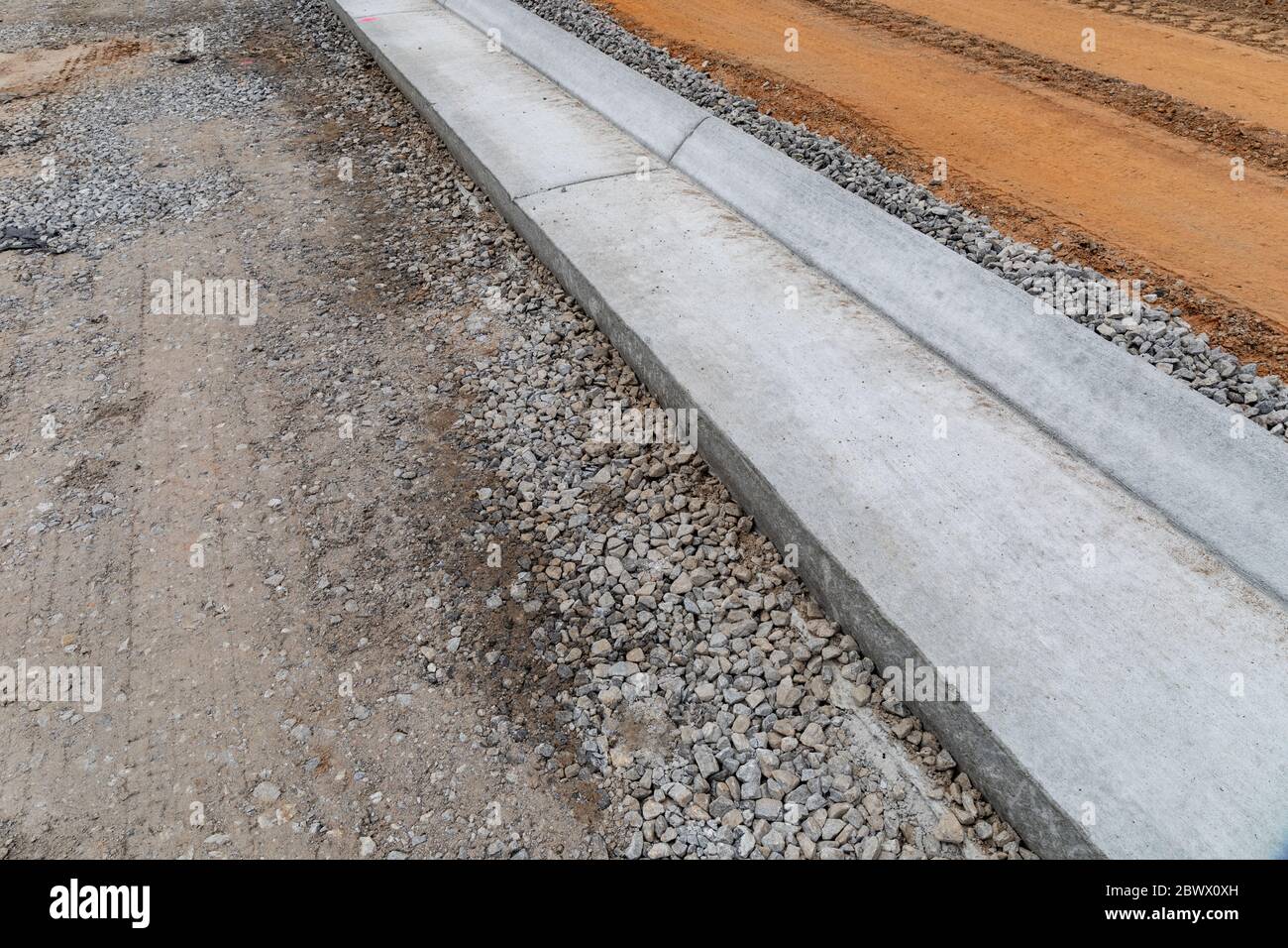 Dirt, concrete, and gravel road construction details, extruded curb and ...