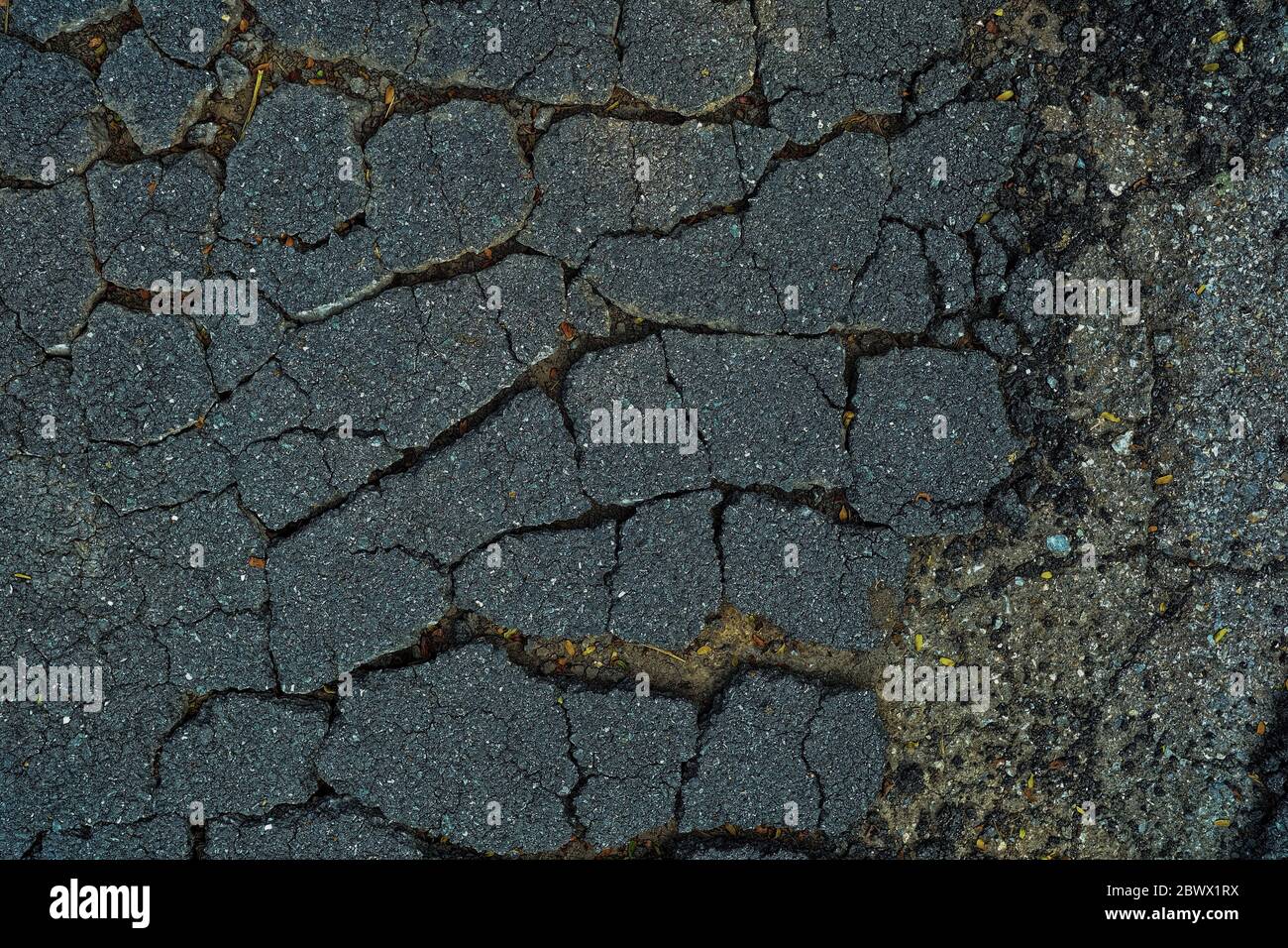 Close up Broken Asphalt Road Background Stock Photo - Alamy