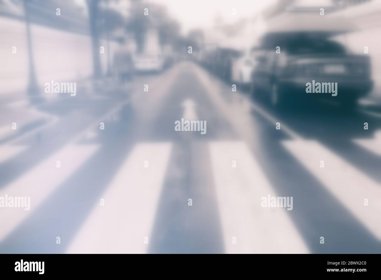 Blurred White Pedestrian Crosswalk Background Stock Photo - Alamy